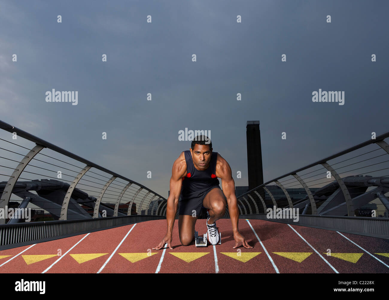 Male sprinter in blocks hi-res stock photography and images - Alamy