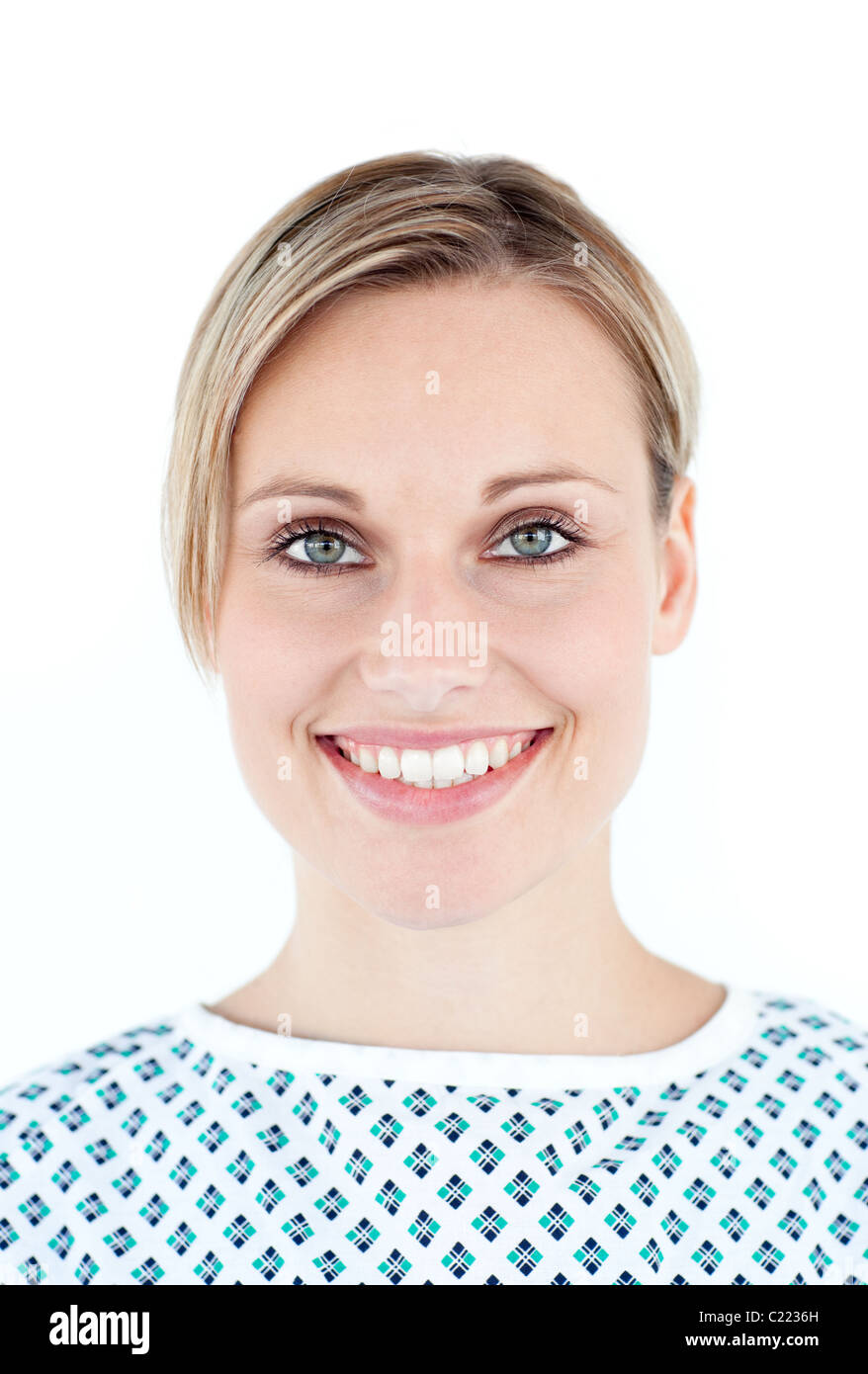 Smiling female patient against a white background Stock Photo - Alamy