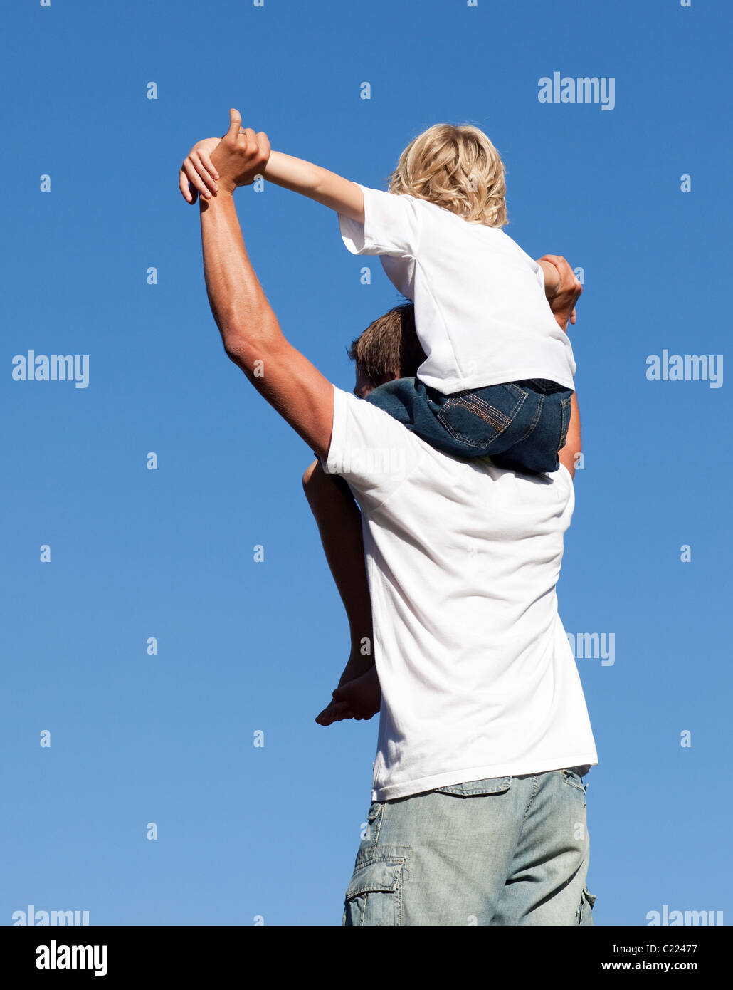 Father with his son on his back outdoor Stock Photo - Alamy