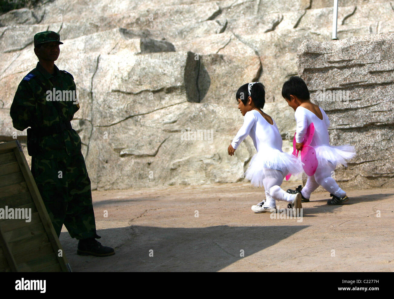 Mini-Land Little performers entertain visitors to Dwarf Kingdom, a ...