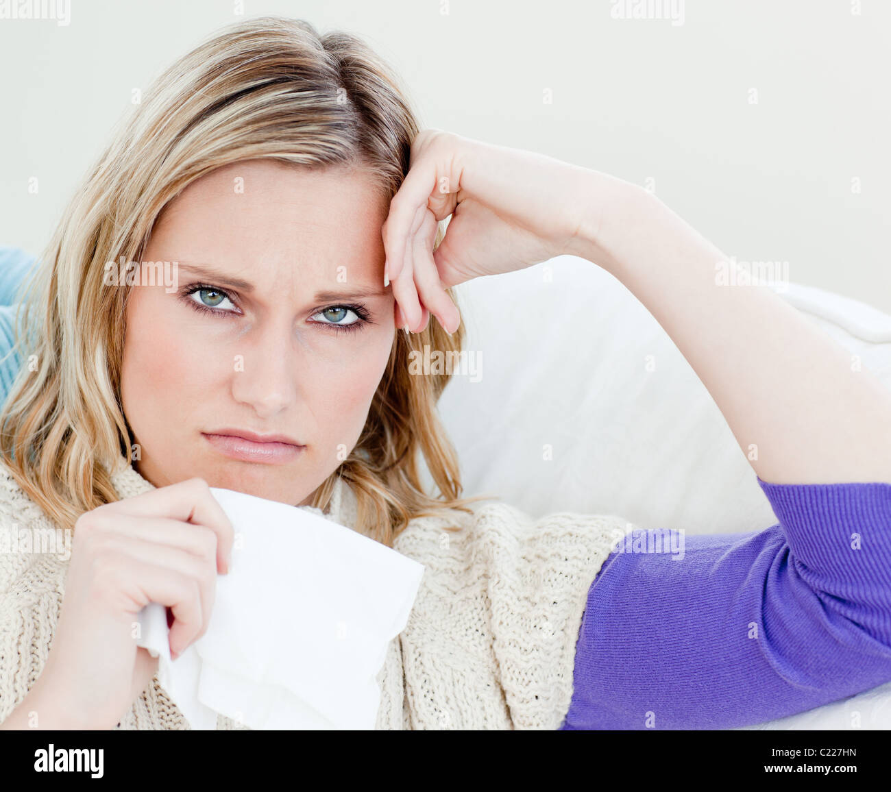 Woman sniffles tissues hi-res stock photography and images - Alamy