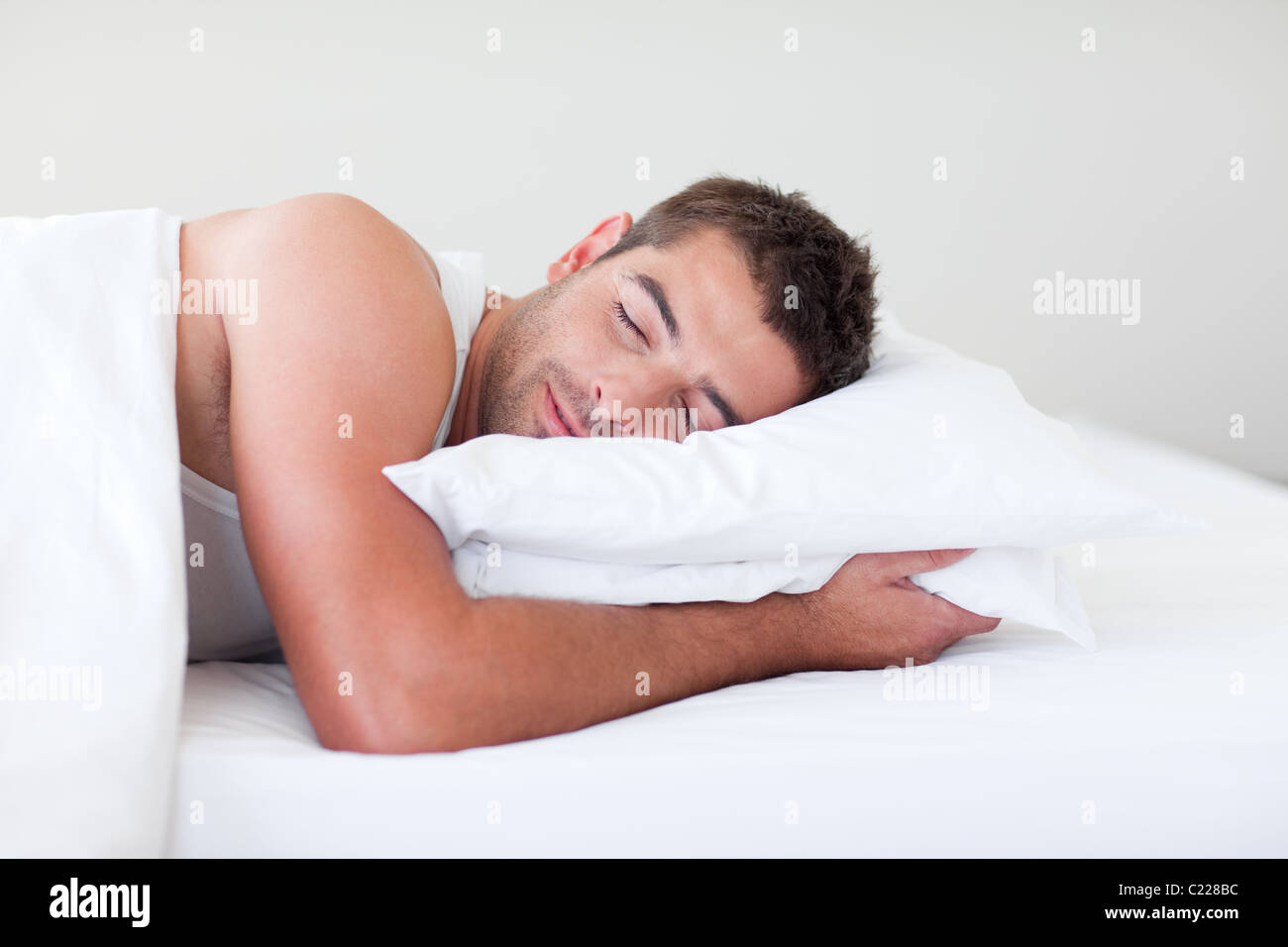 Beautiful man sleeping Stock Photo - Alamy