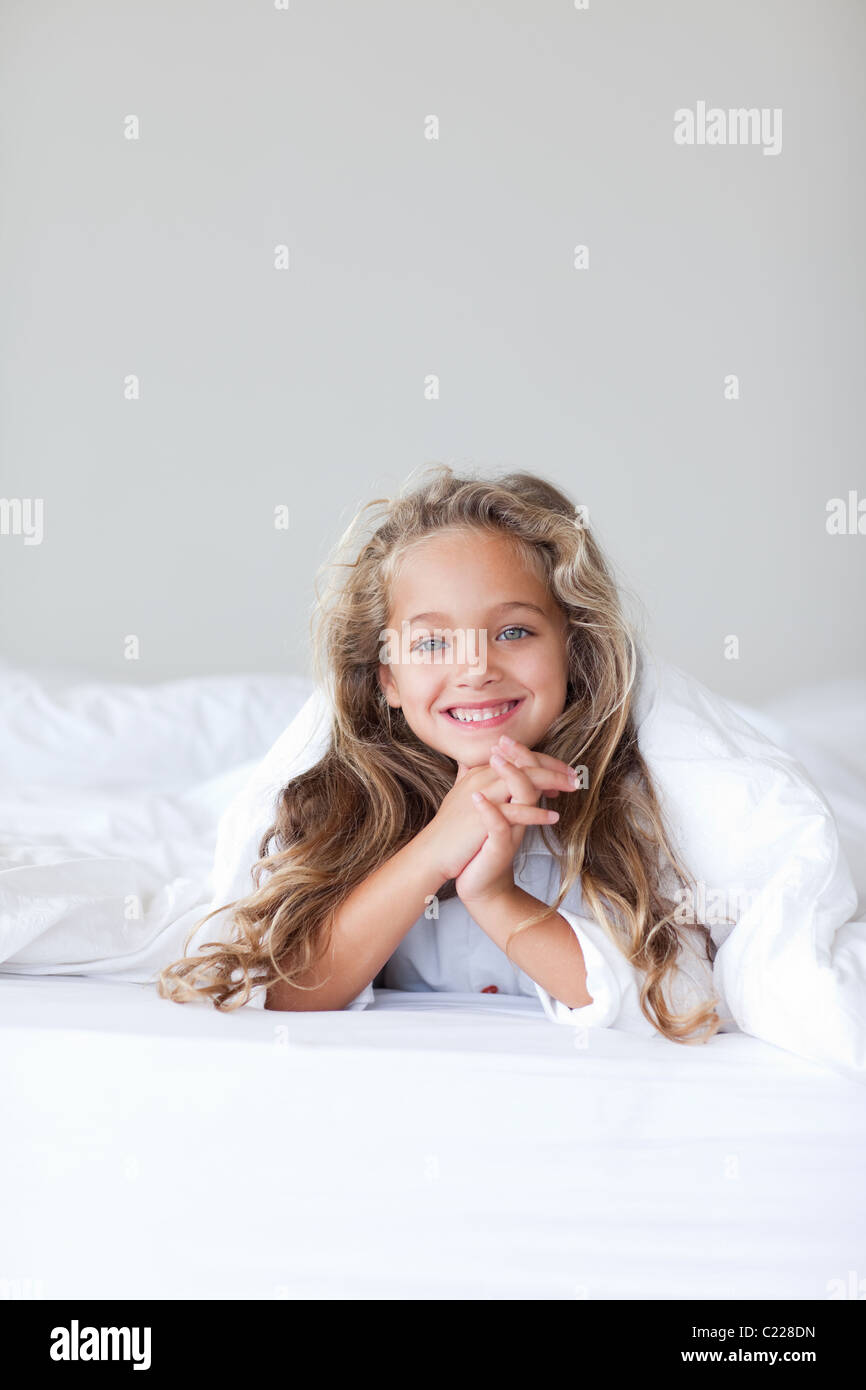 Cute child smiling at the camera Stock Photo - Alamy