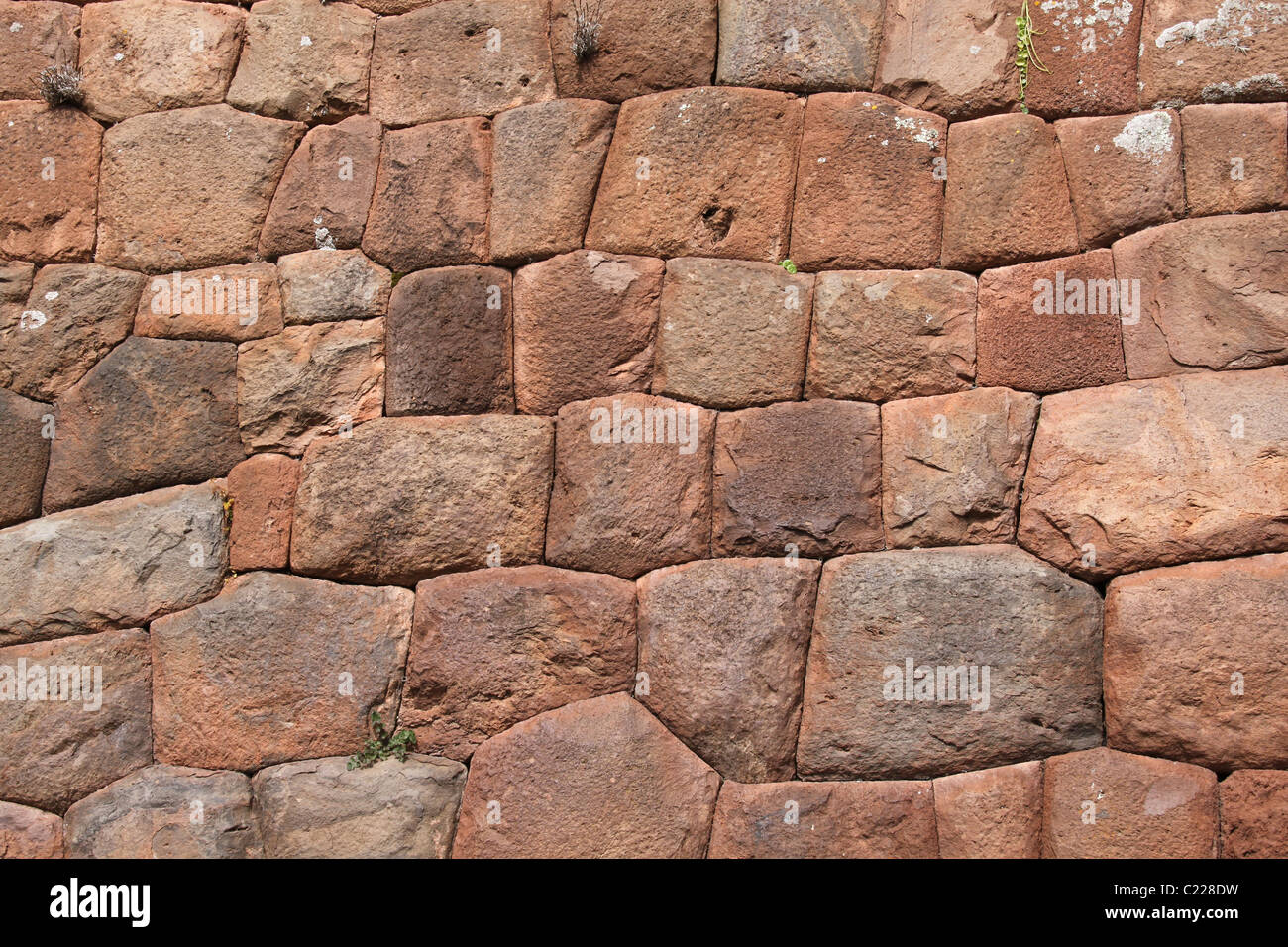 Typical stone wall Incan construction in Pisac ruins Stock Photo - Alamy