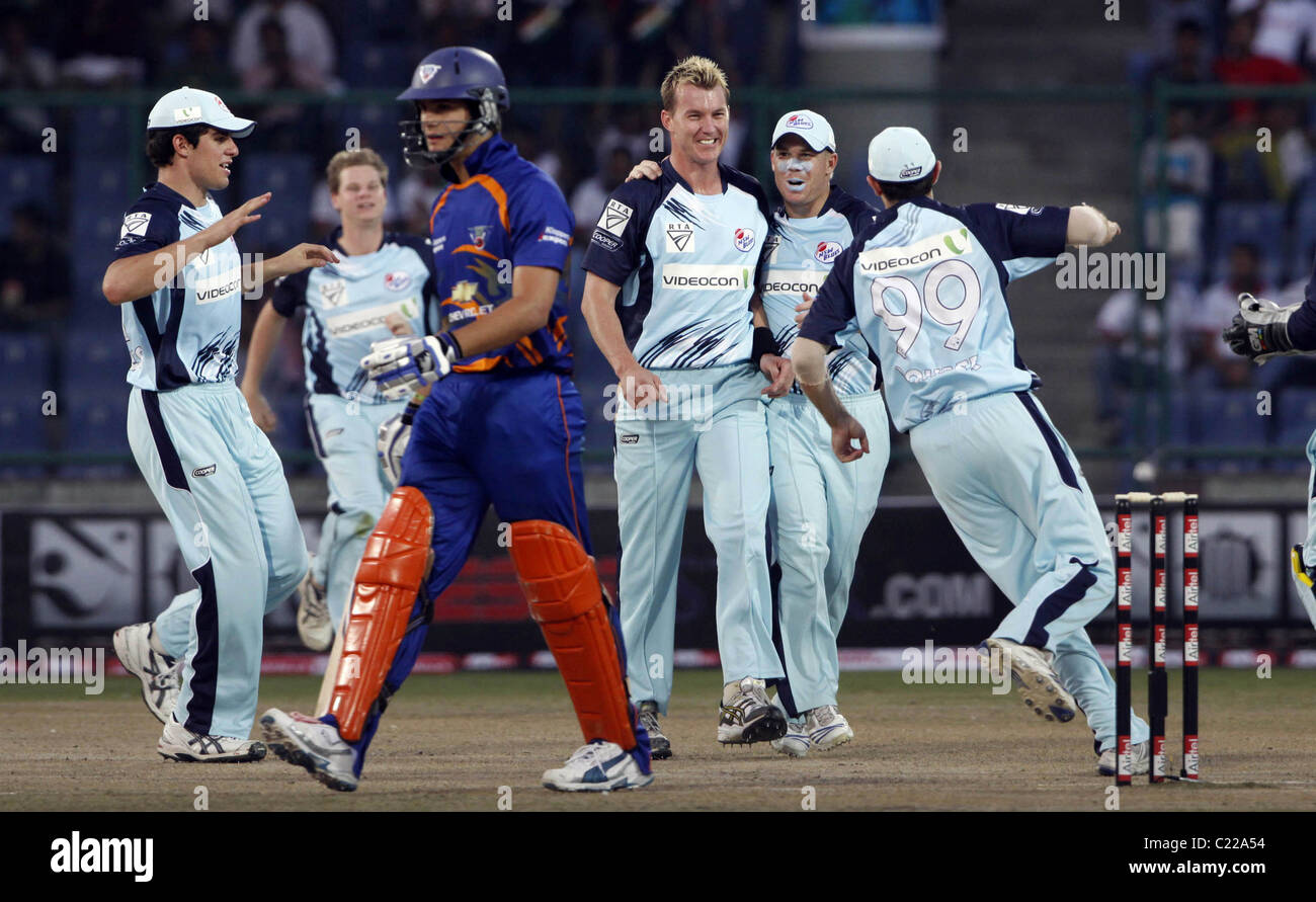 Brett Lee of the NSW Blues celebrates with team mates after taking the ...