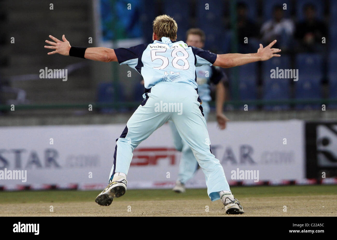 Brett Lee of the NSW Blues celebrates with team mates after taking the ...