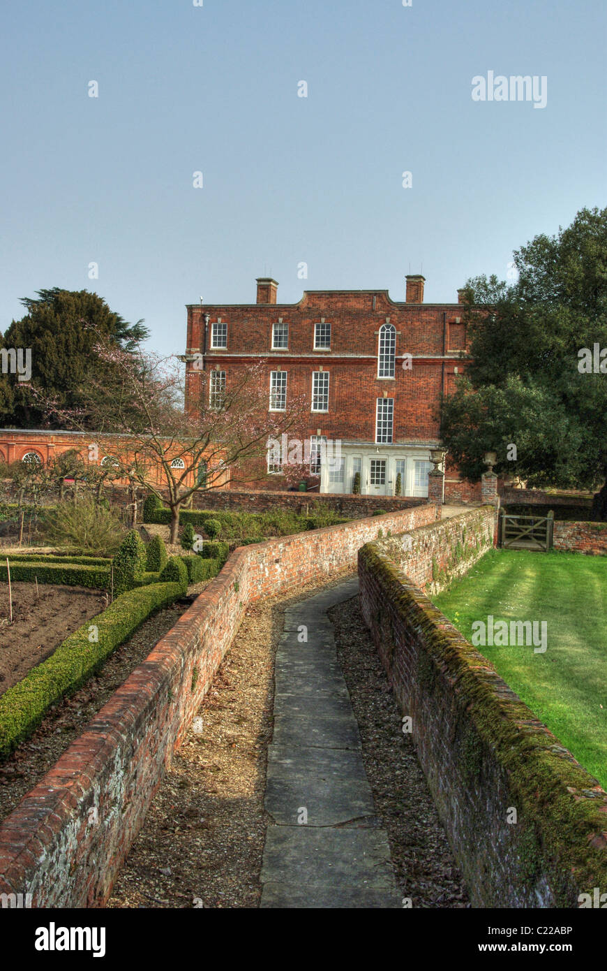 Path leading through the kitchen garden to Chicheley Hall, now home to ...