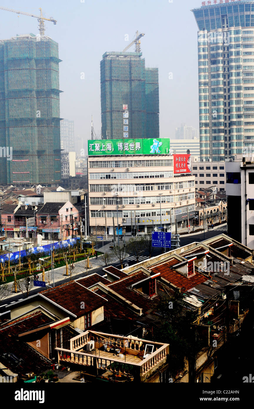 View of new buildings over rooftops in Shanghai Stock Photo - Alamy