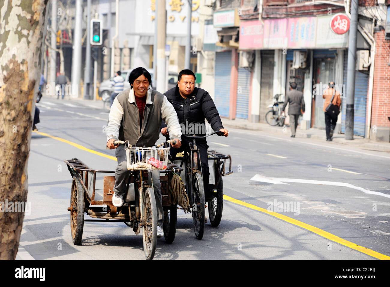 Chinese people with tricycles hi-res stock photography and images - Alamy