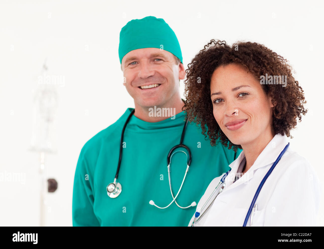 Portrait of a handsome nurse smiling at the camera Stock Photo - Alamy