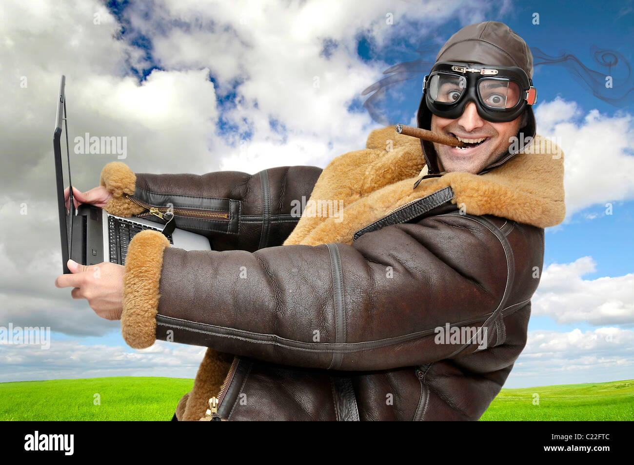 Fighter pilot with laptop at full speed Stock Photo - Alamy