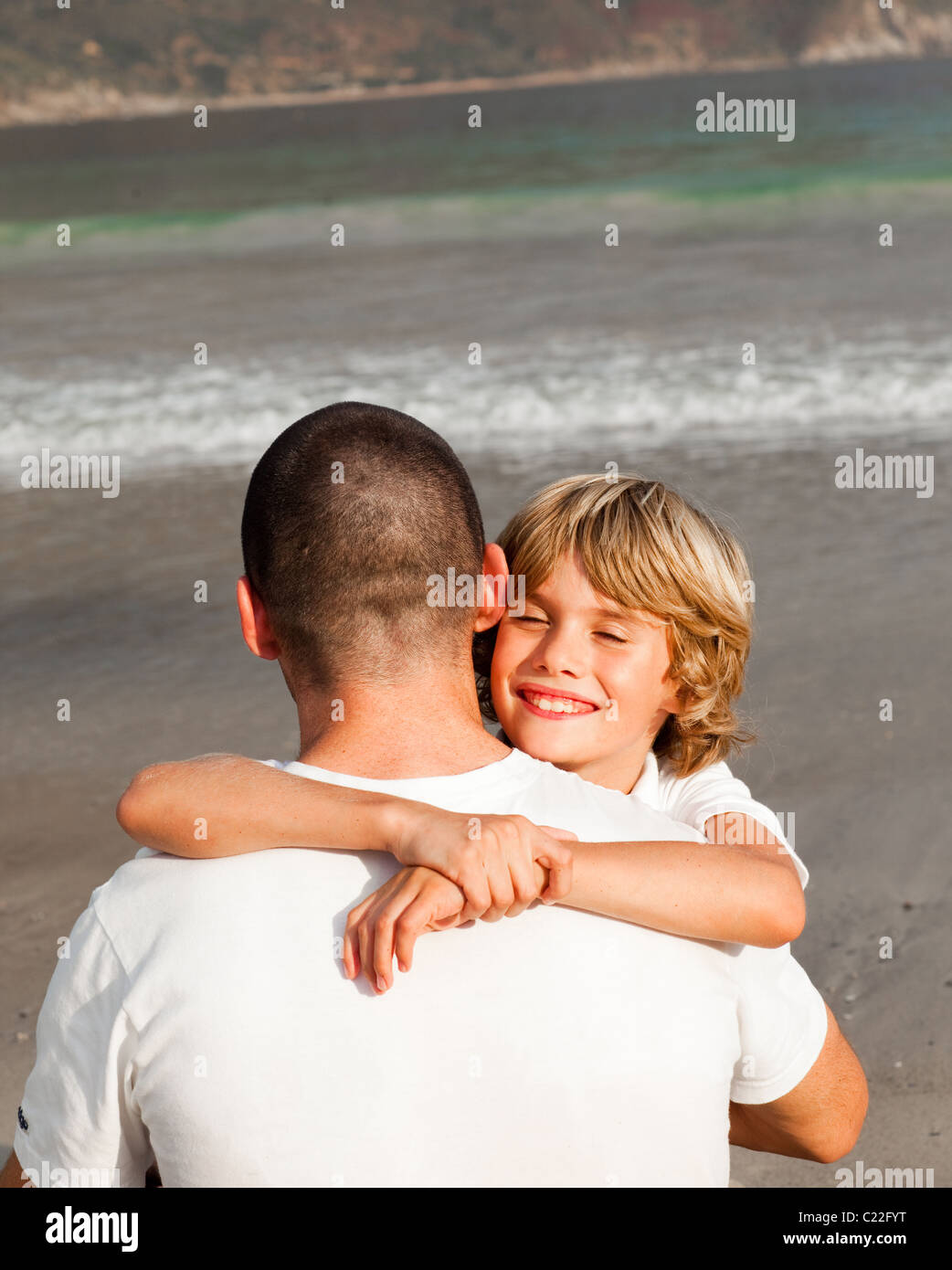 Portrait of a cute Boy Hugging his father Stock Photo - Alamy