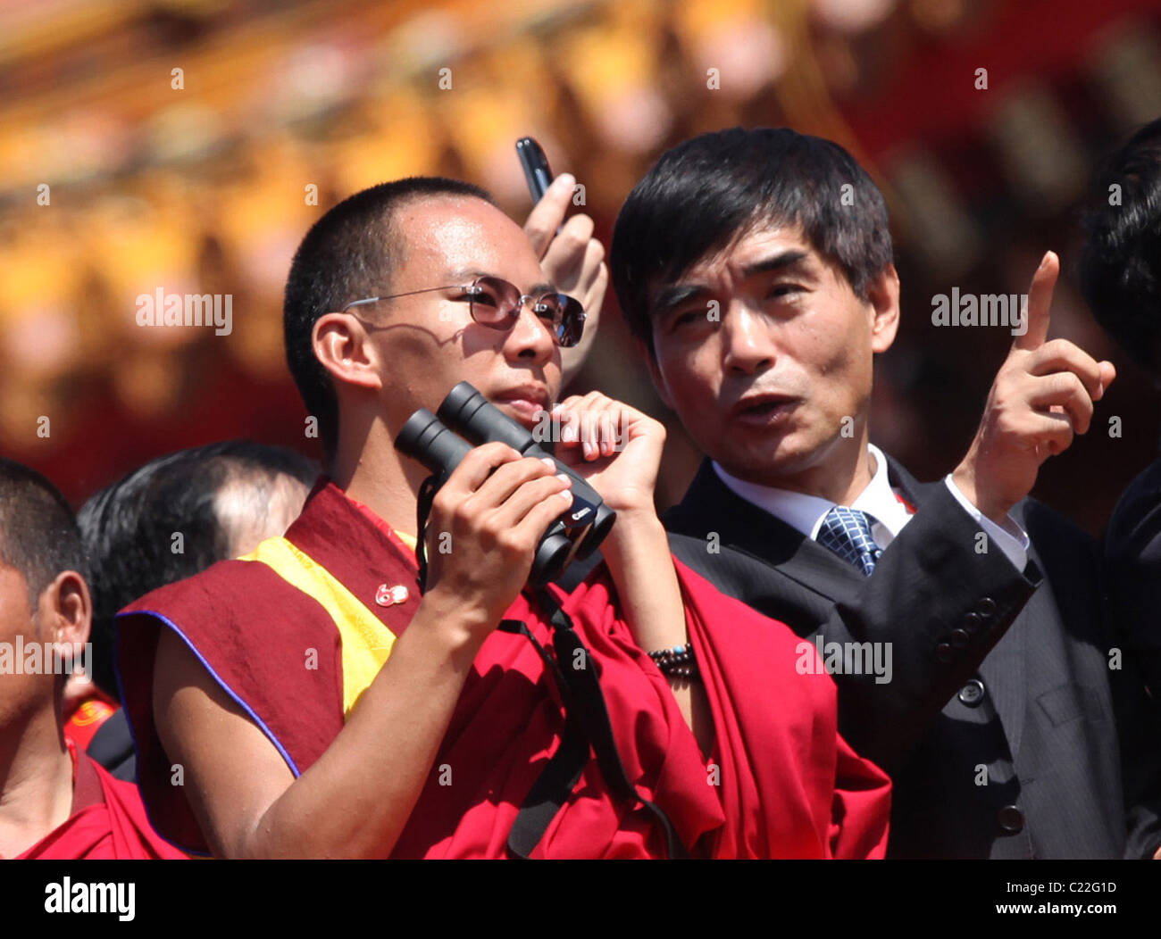 The 11th Panchen Erdeni (left) attends the parade in celebration of the ...