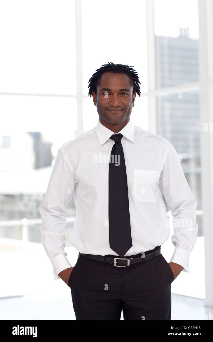 Portrait of a manager looking at the camera Stock Photo - Alamy