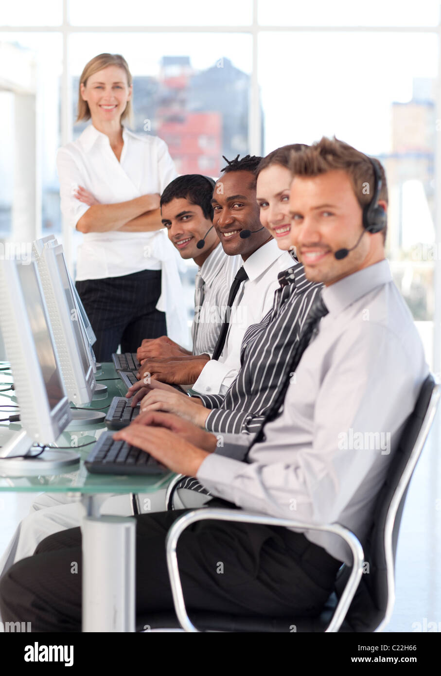 Cheerful manager leading her representative team Stock Photo - Alamy