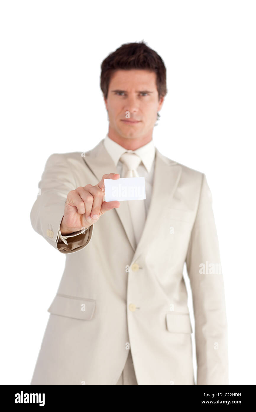 Charming businessman holding a white card Stock Photo - Alamy
