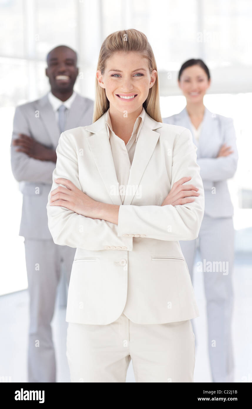 Beautiful female manager with her team Stock Photo - Alamy
