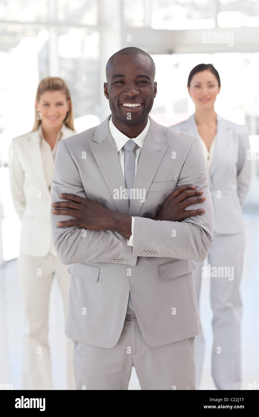 Cute manager with his team Stock Photo - Alamy