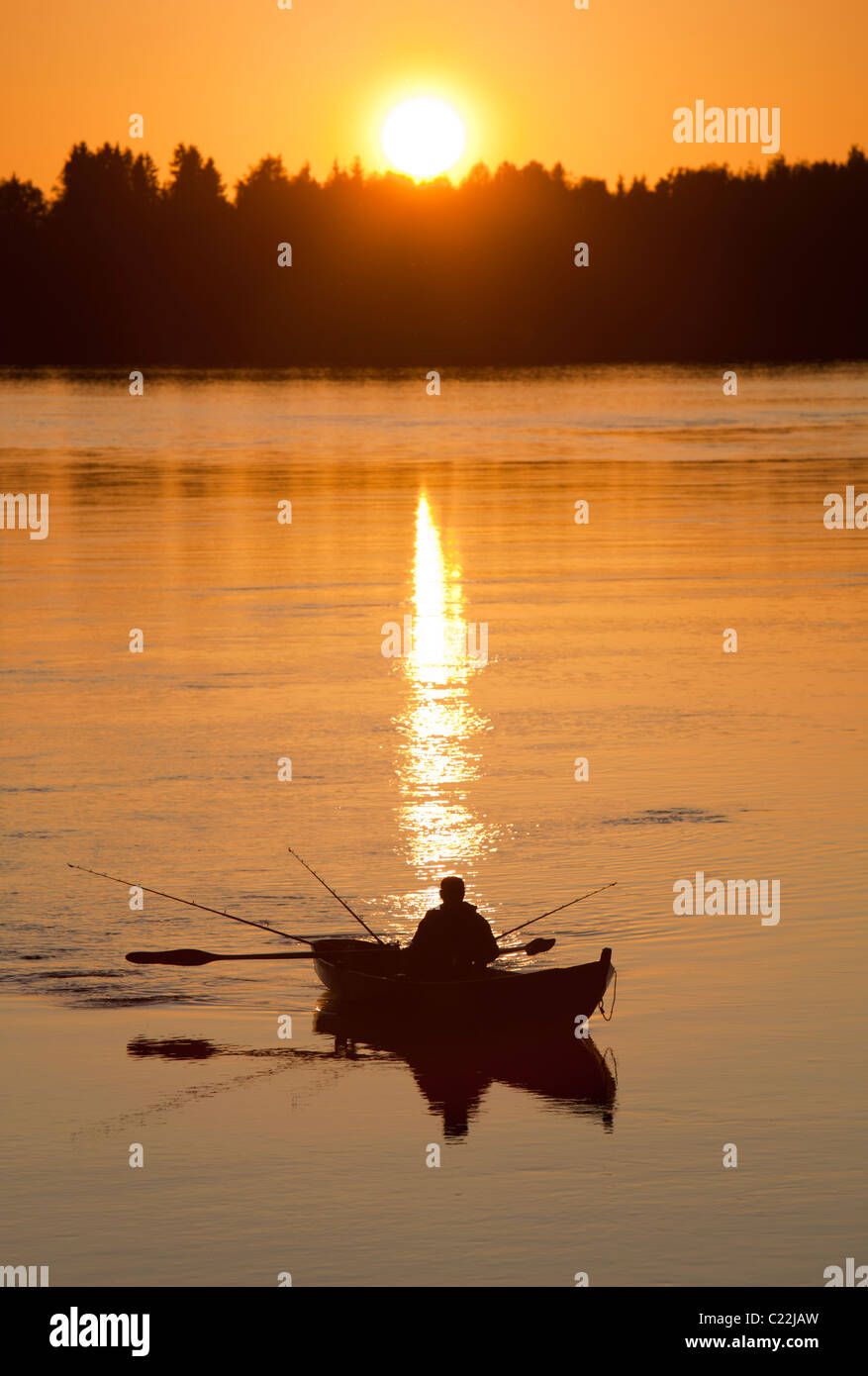 Side profile of a man fishing in a boat hi-res stock photography and ...