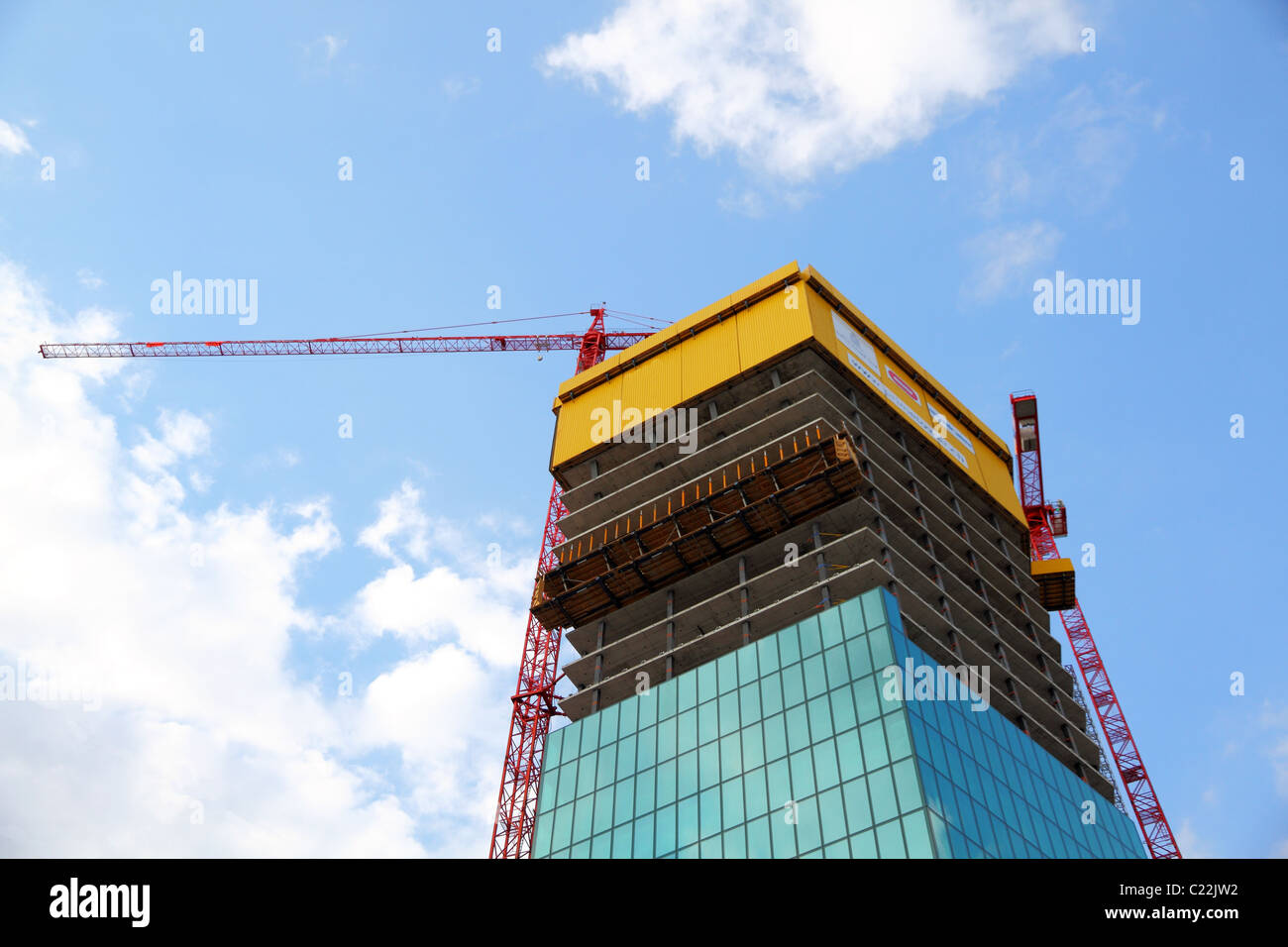 construction of a modern high rised building "Sunrise Tower 1" with ...