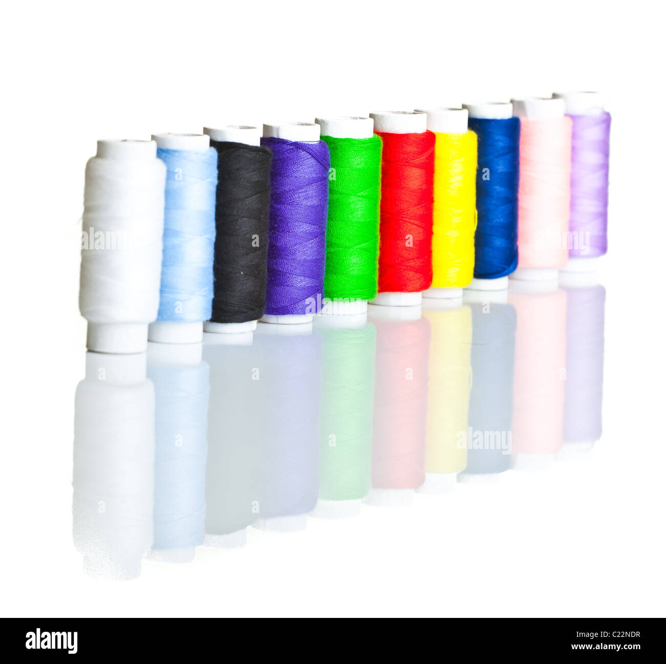 Colorful sewing threads and tools on white isolated background Stock ...