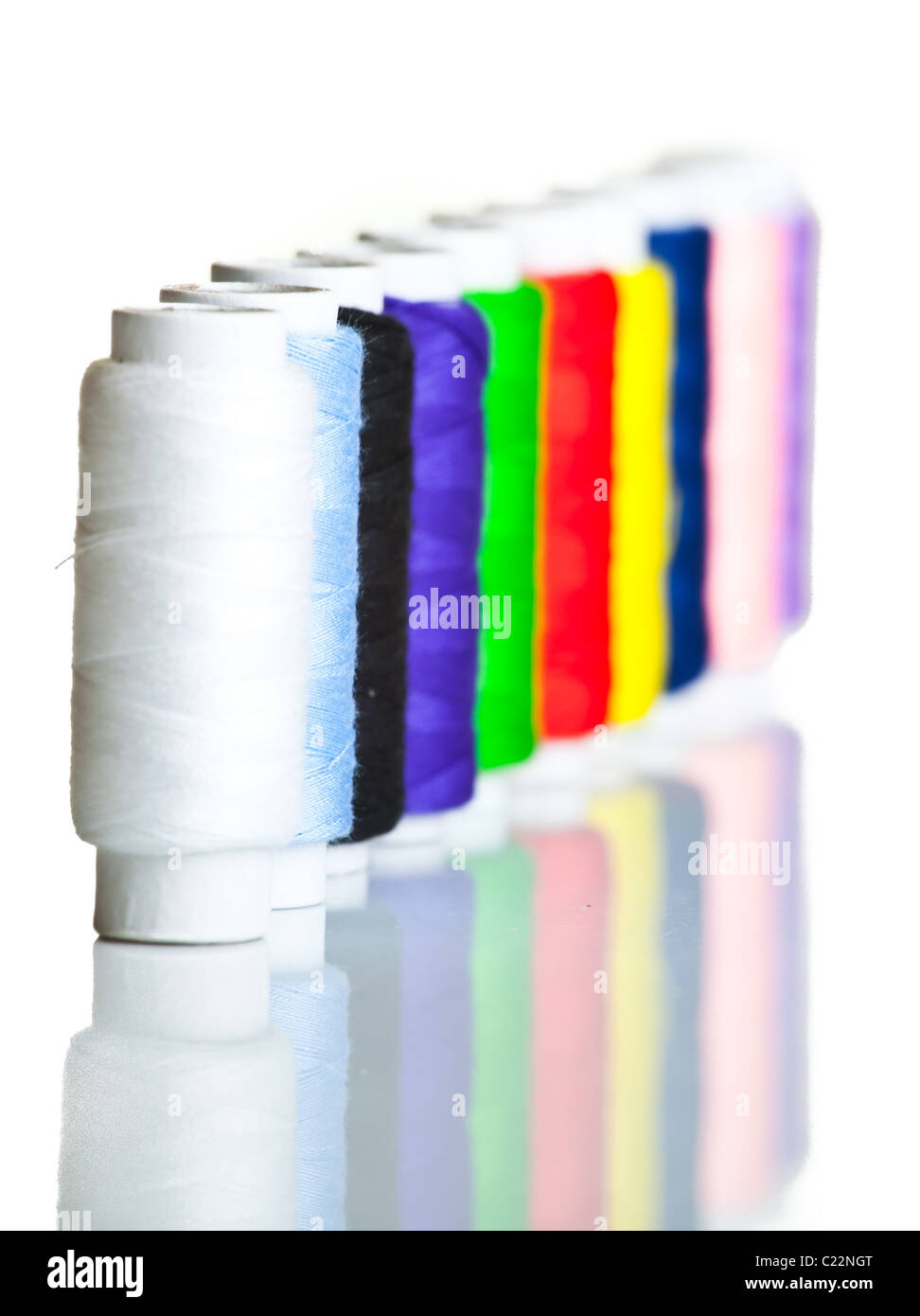 Colorful sewing threads and tools on white isolated background Stock ...