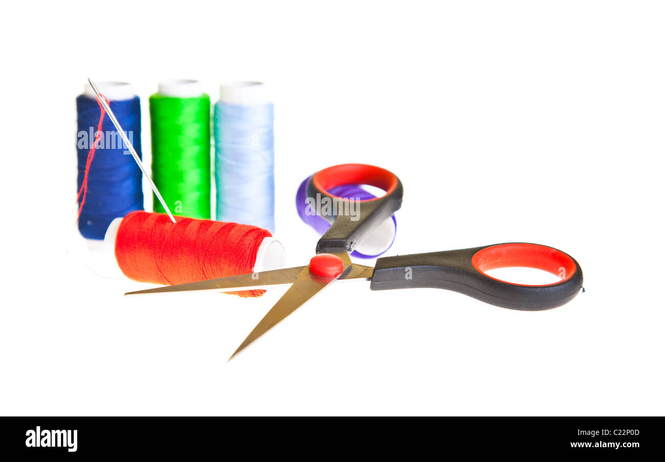 Colorful sewing threads and tools on white isolated background Stock ...