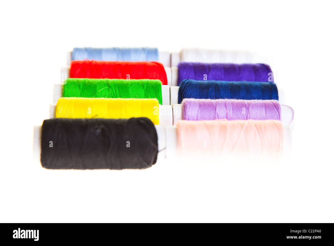 Colorful sewing threads and tools on white isolated background Stock ...