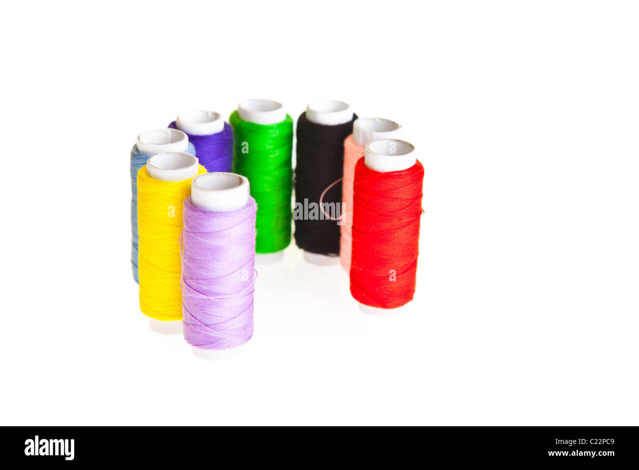 Colorful sewing threads and tools on white isolated background Stock ...