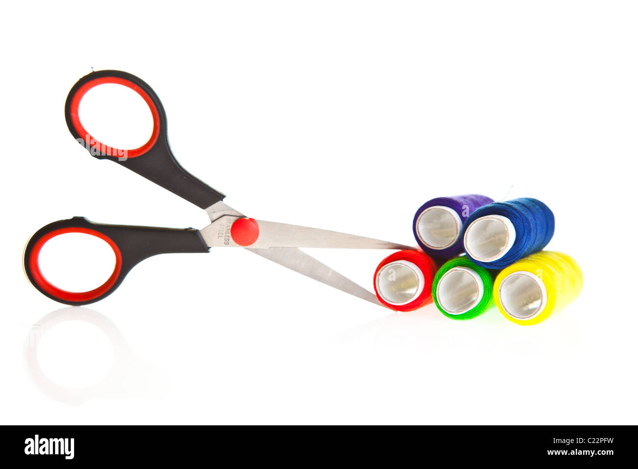 Colorful sewing threads and tools on white isolated background Stock ...