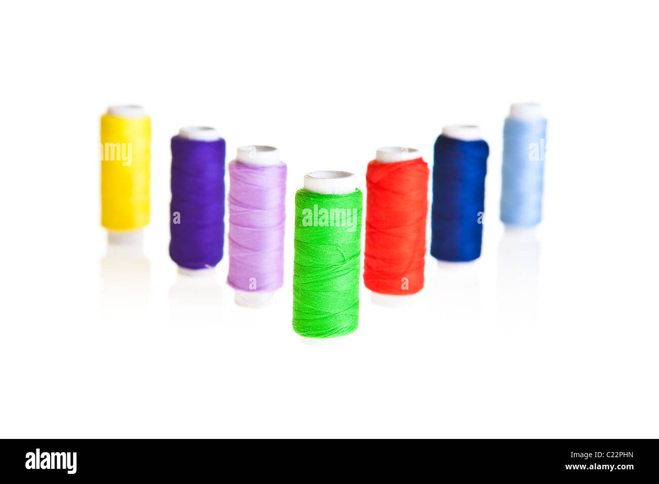 Colorful sewing threads and tools on white isolated background Stock ...