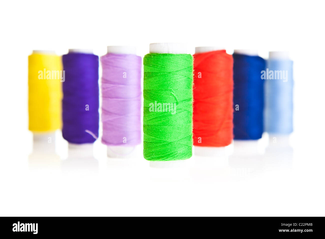 Colorful sewing threads and tools on white isolated background Stock ...
