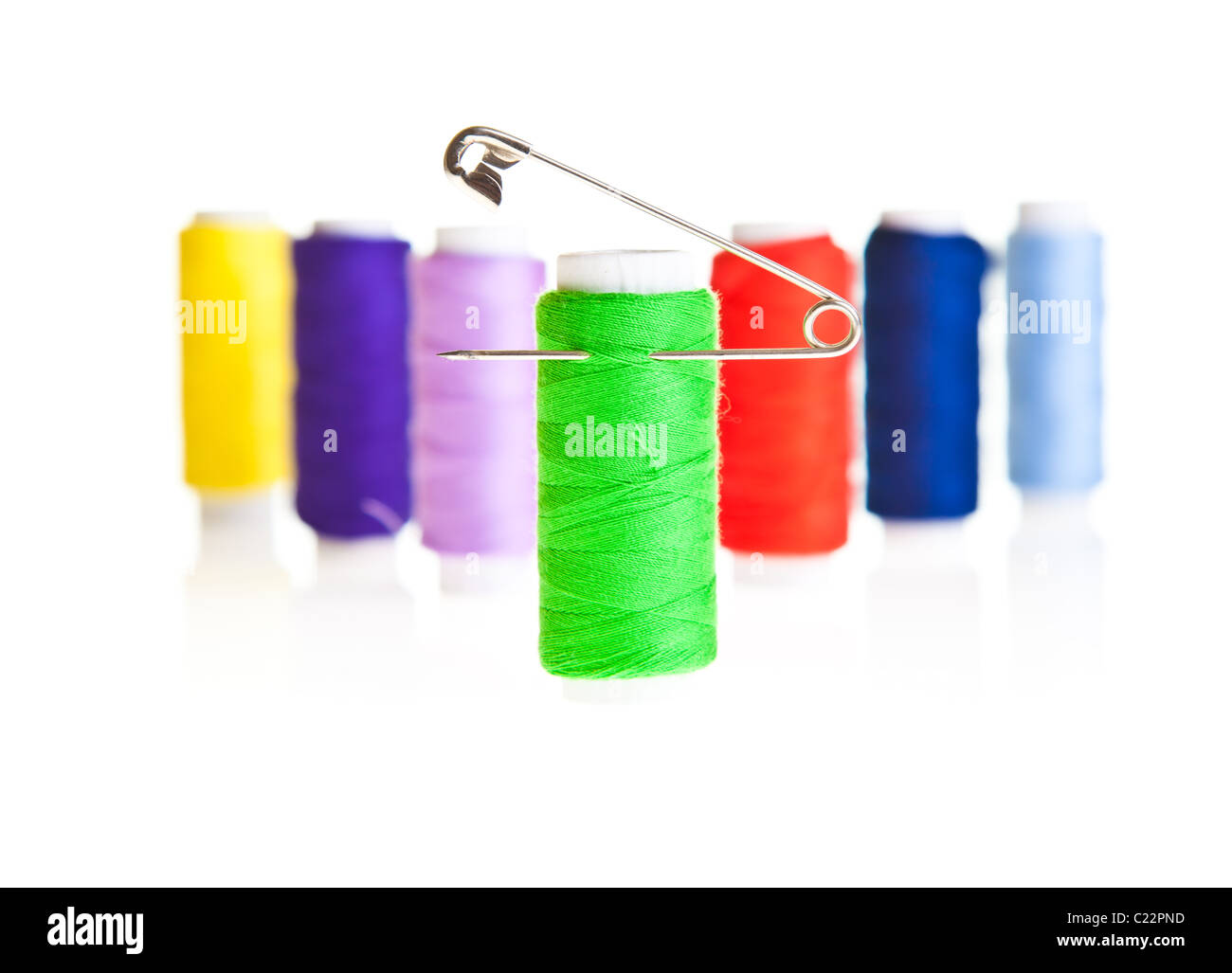 Colorful sewing threads and tools on white isolated background Stock ...