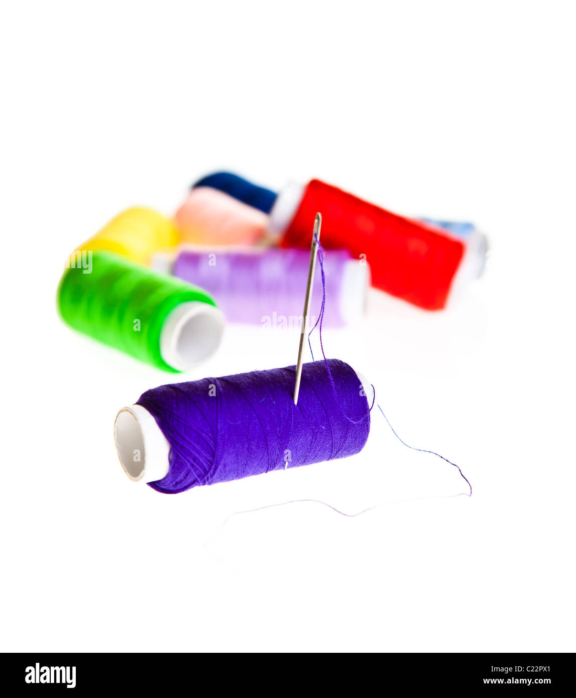 Colorful sewing threads and tools on white isolated background Stock ...