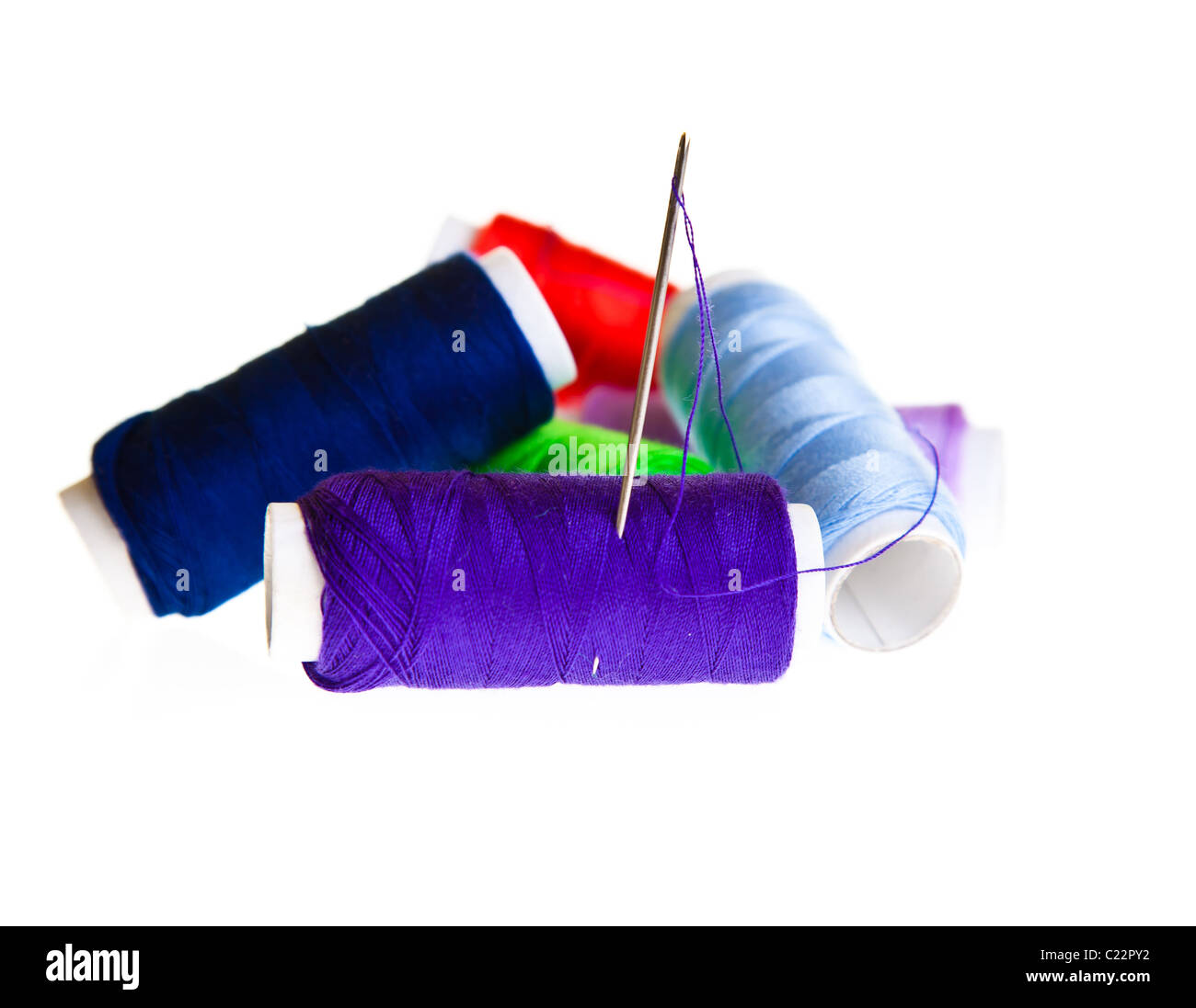 Colorful sewing threads and tools on white isolated background Stock ...