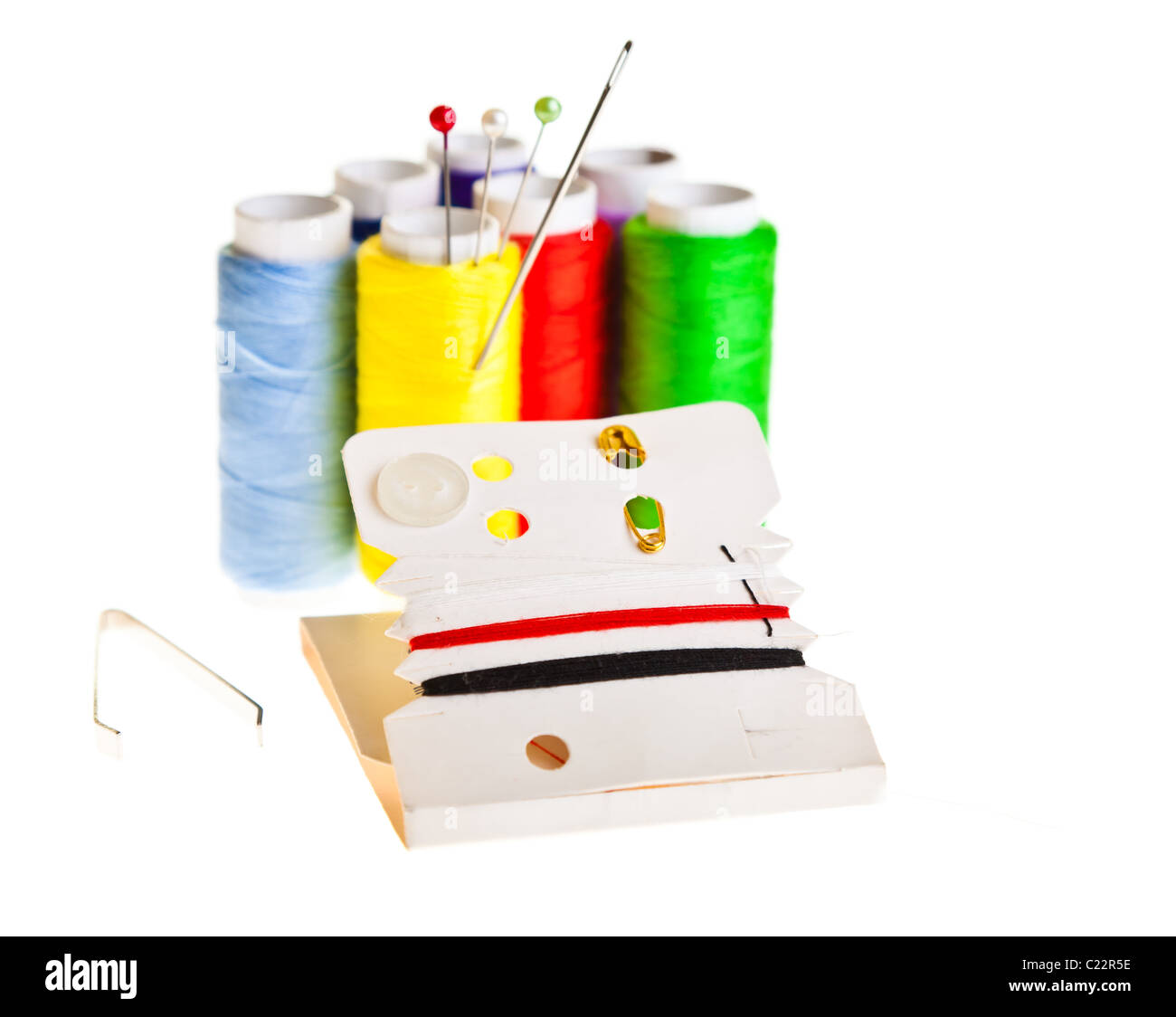 Colorful sewing threads and tools on white isolated background Stock ...