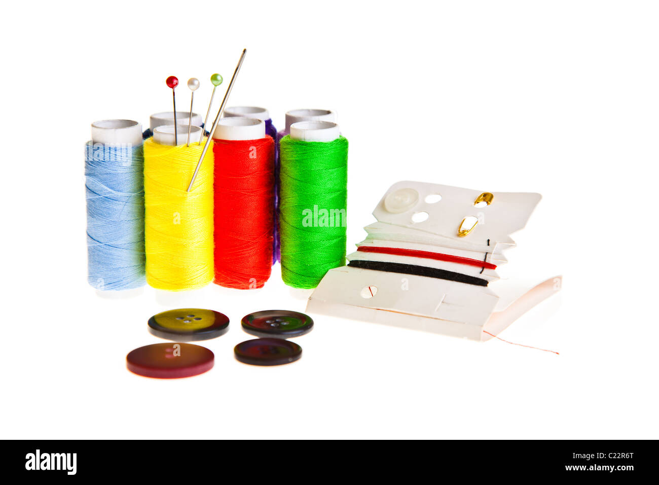Colorful sewing threads and tools on white isolated background Stock ...