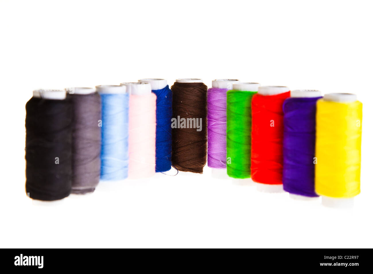 Colorful sewing threads and tools on white isolated background Stock ...