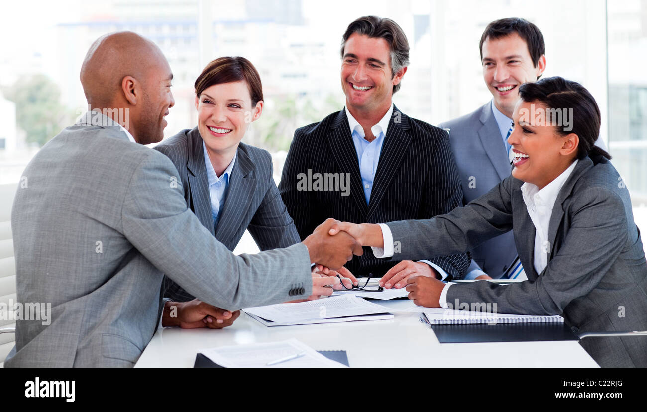 Business people greeting each other Stock Photo - Alamy