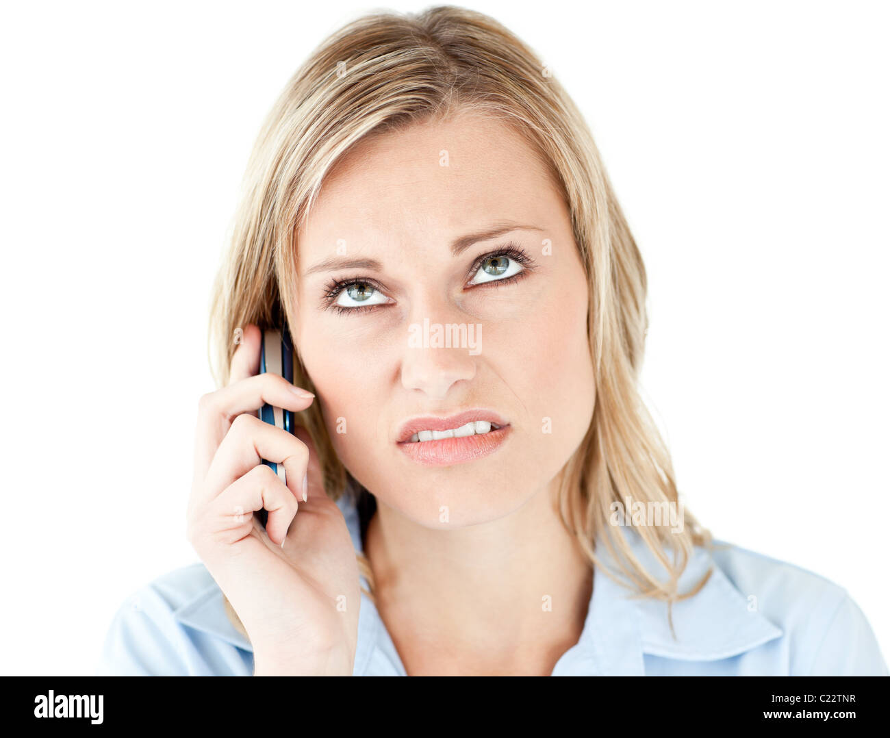 Frustrated businesswoman talking on phone Stock Photo - Alamy
