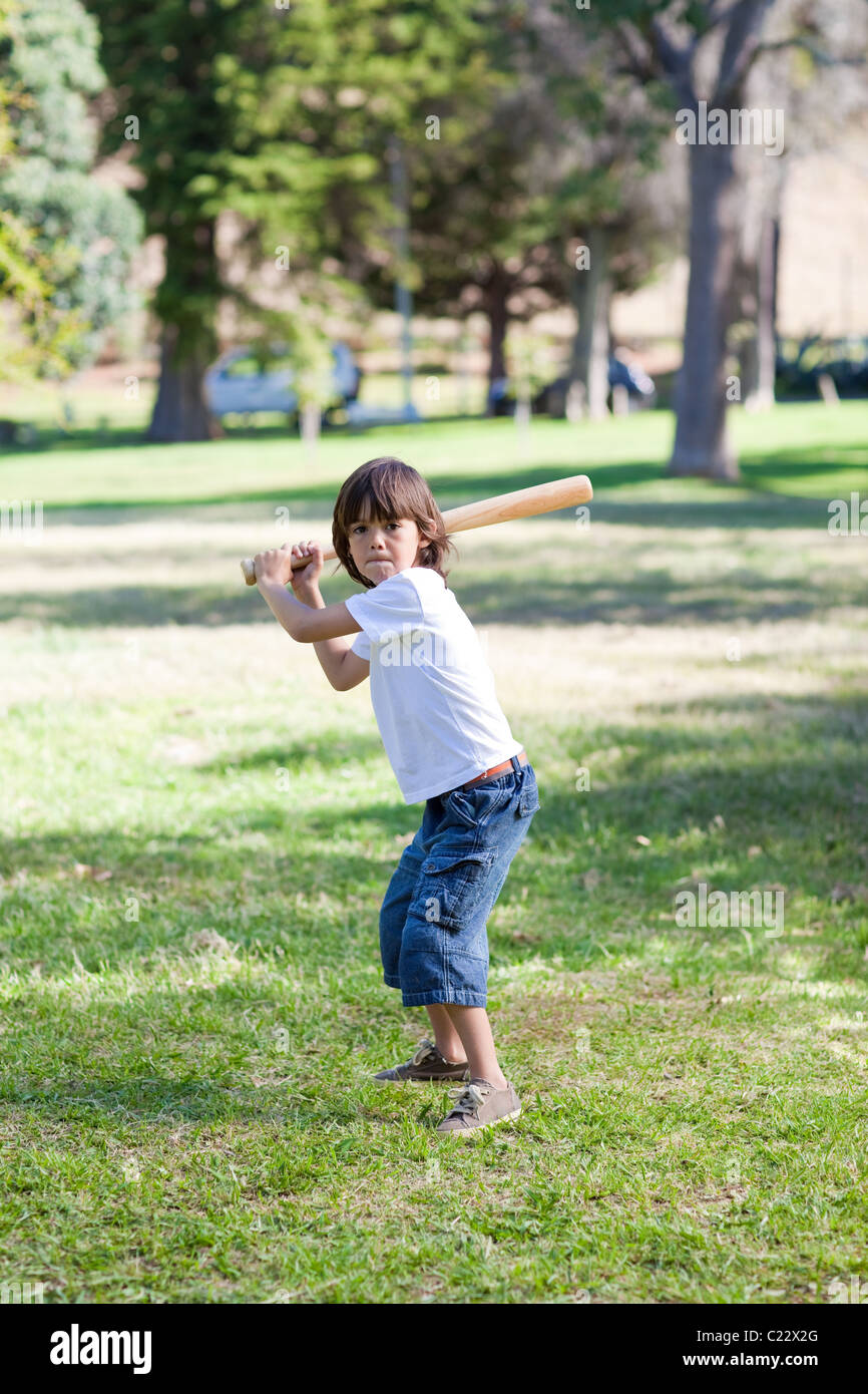 Adorable little boy playing baseball Stock Photo - Alamy