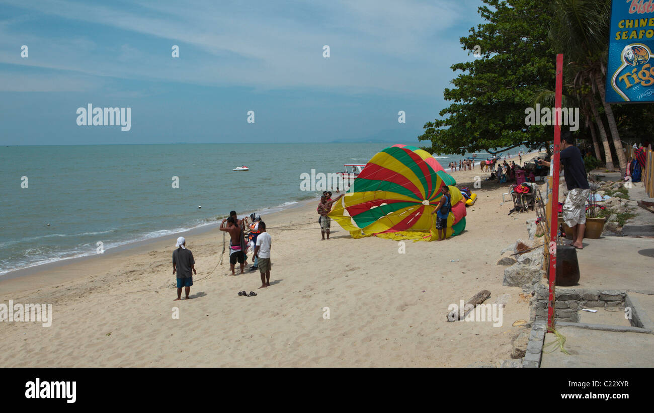 Preparing to Para Sail at Batu Feringgi beach on Penang Island Stock ...