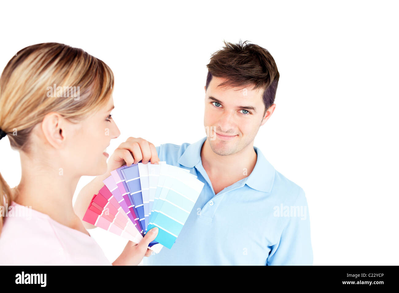 Bright young couple choosing color for a room Stock Photo - Alamy