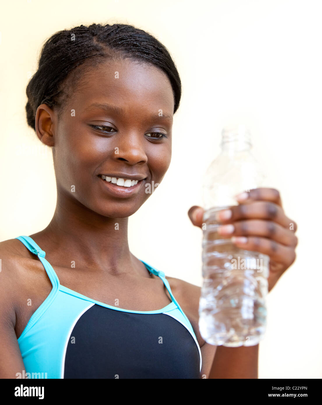Young woman drinking water Stock Photo - Alamy