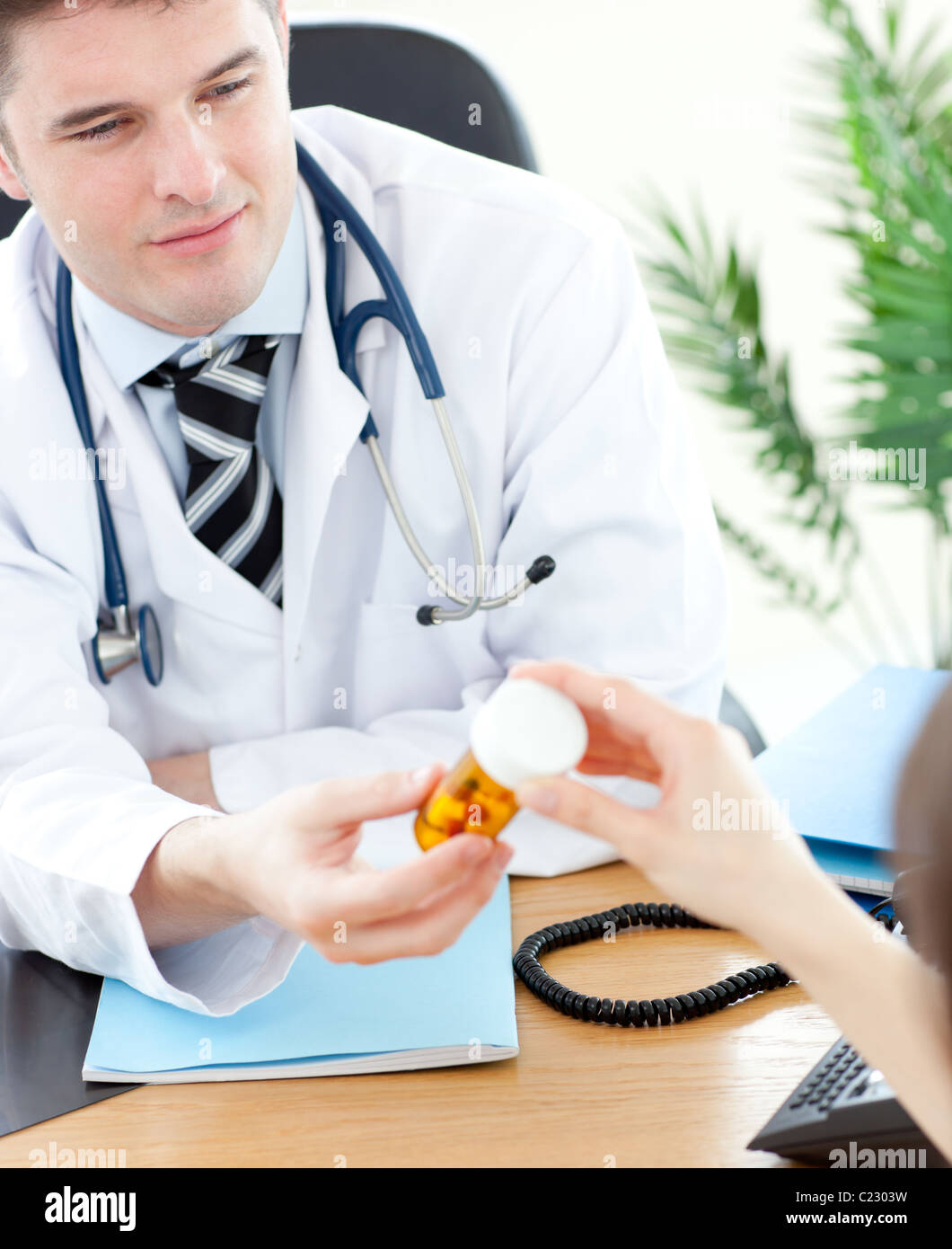 Male doctor at work Stock Photo - Alamy