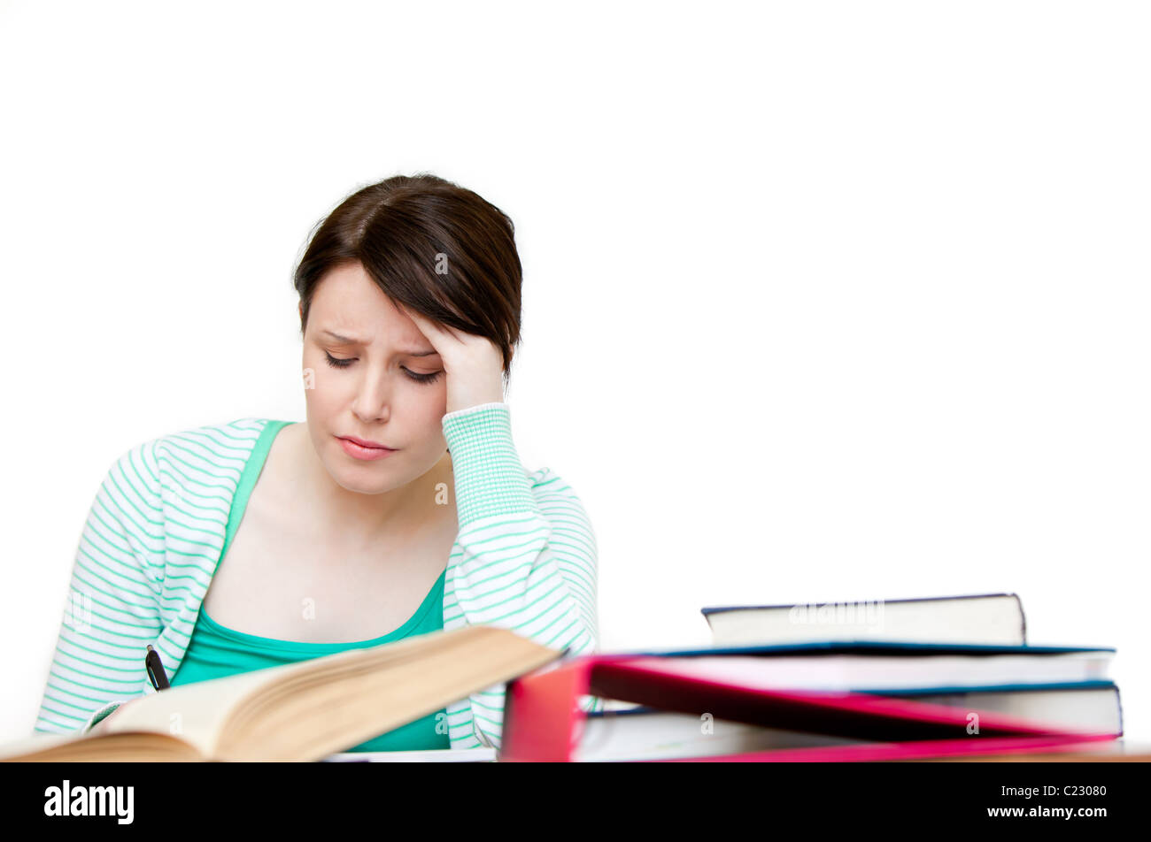 Stressed student doing her homework Stock Photo - Alamy