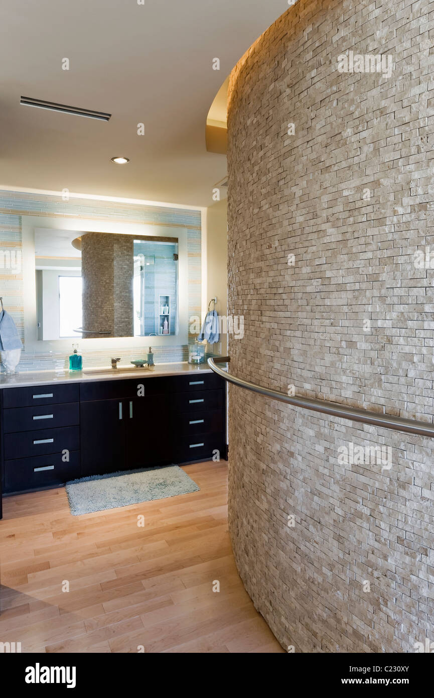 Bathroom interior with large curved wall Stock Photo - Alamy