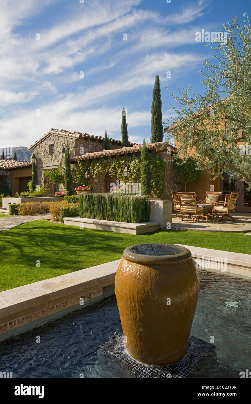 Exterior of a house:with a garden:plants and a water feature Stock ...