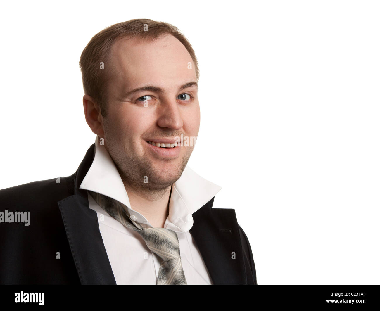 portrait of an unshaven businessman in a gray suit with a white ...