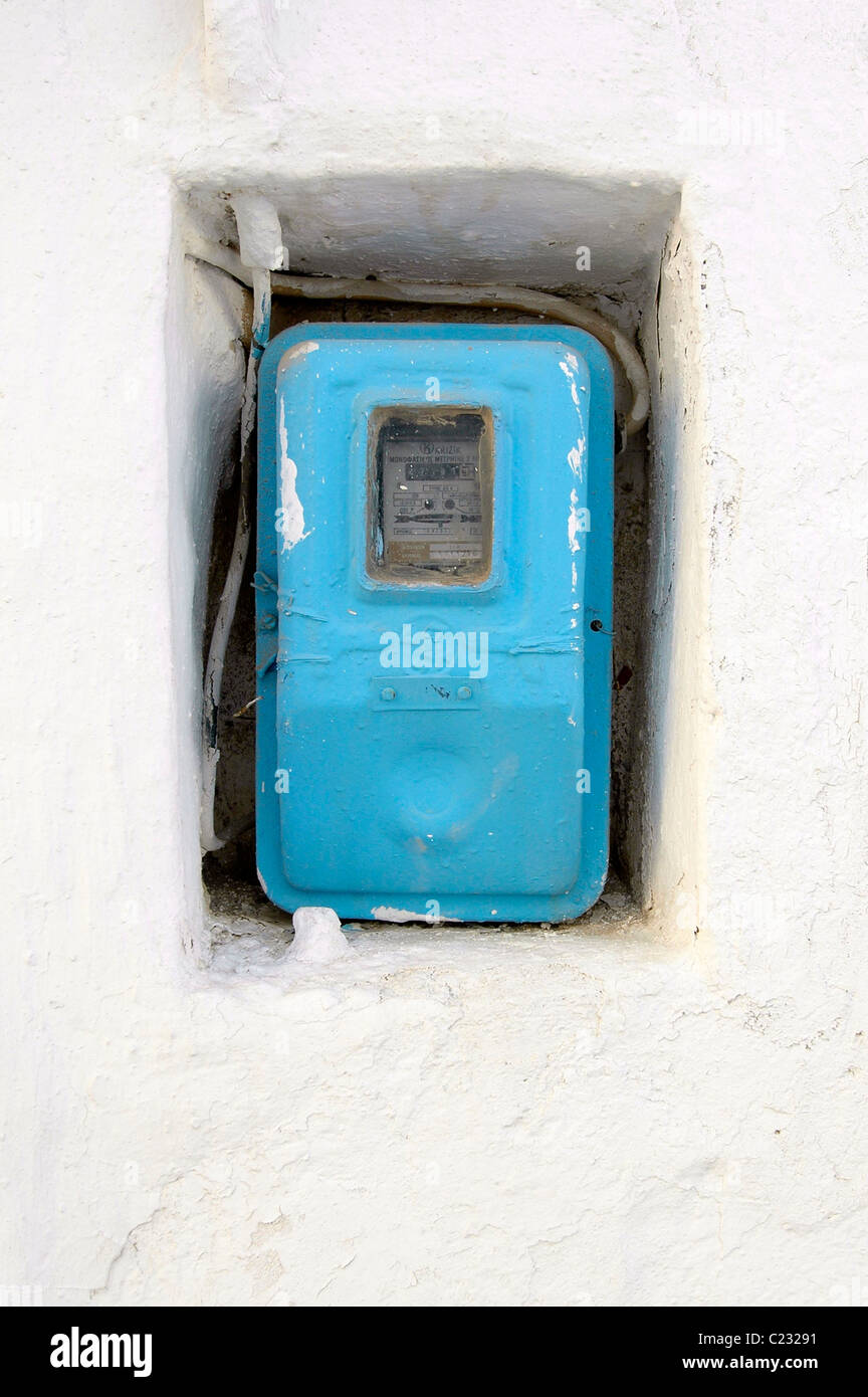 A blue electricity meter. Blue windows and shutters is a common sight ...